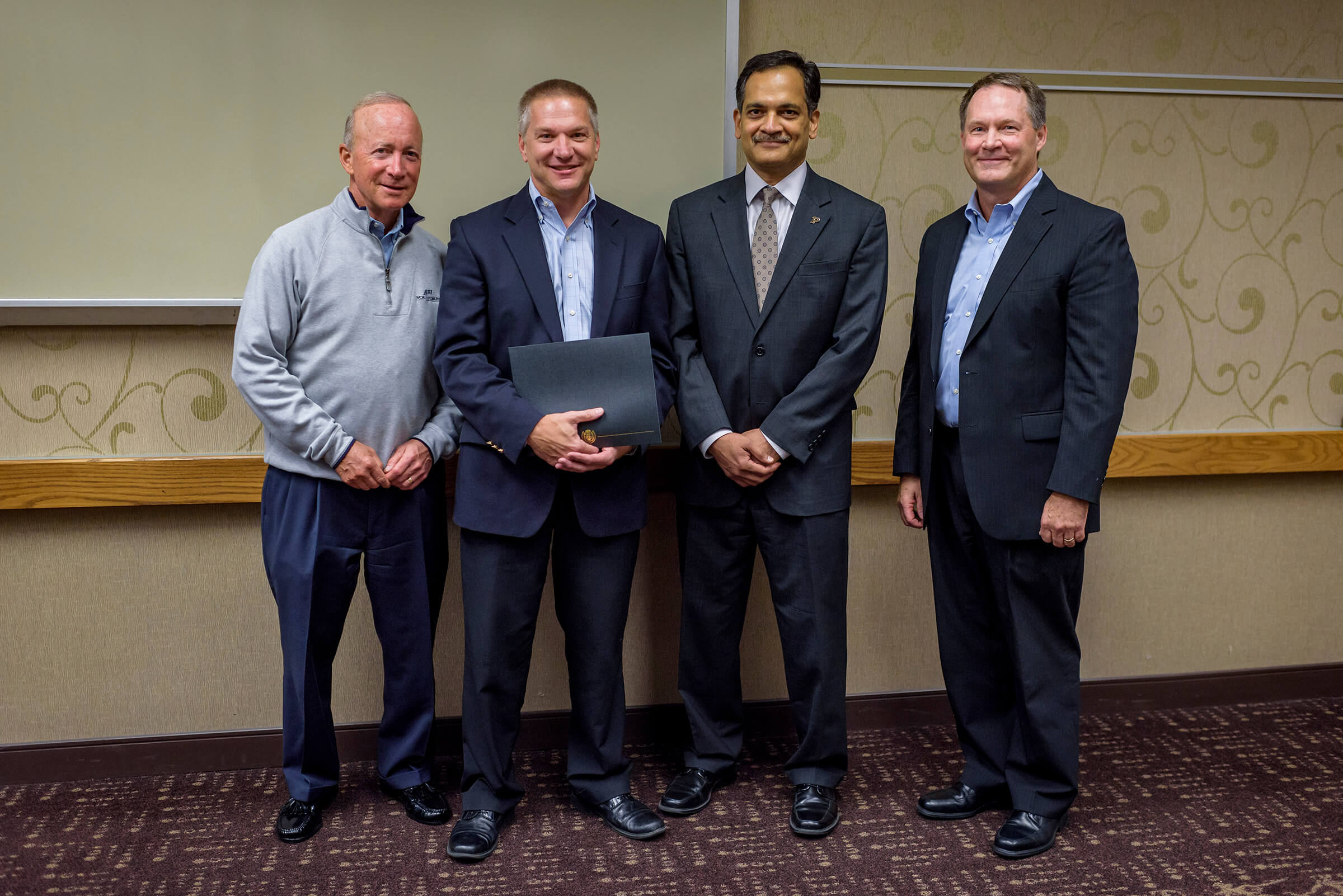 Daniels recognizes Ken Sandel with One Brick Higher Award - Purdue ...