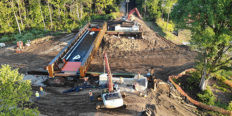 Newman Road project hits major milestone with new railroad bridge ...